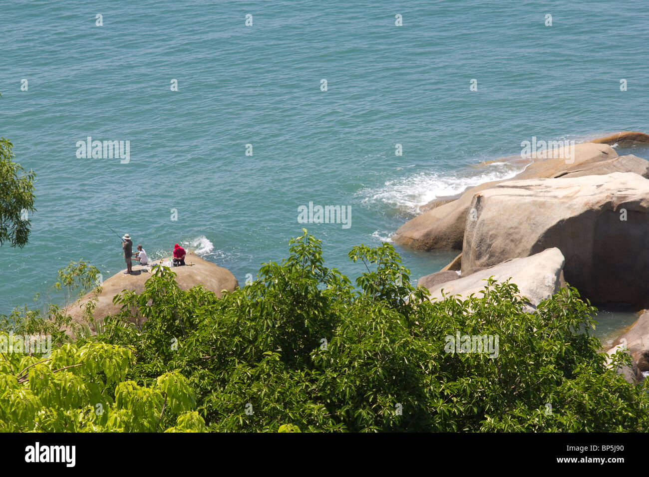 Fishing off the rocks hi-res stock photography and images - Alamy