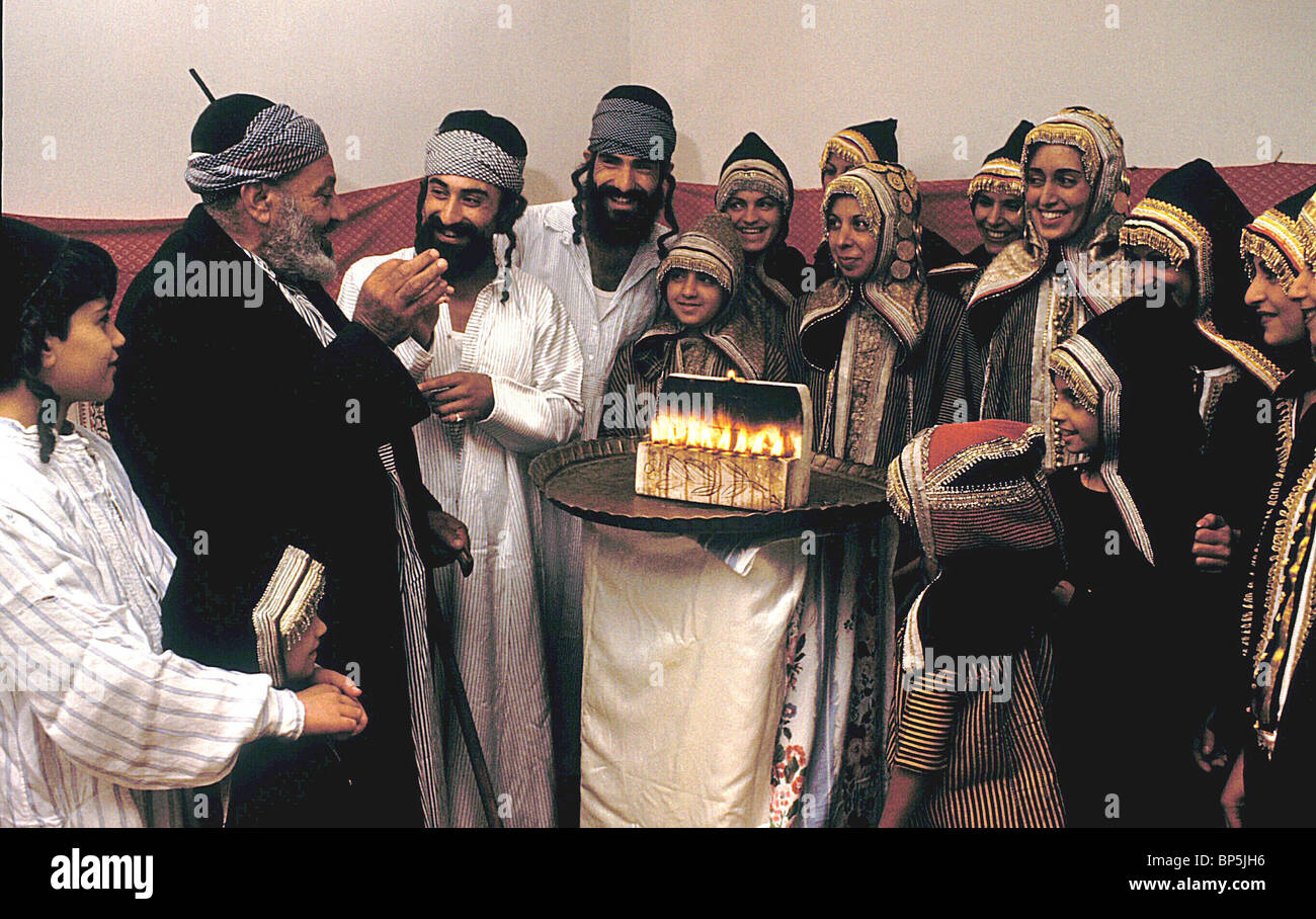 3950. YEMENITE JEWS LIGHTING A TRADITIONAL STONE MADE "HANUKIYAH ...