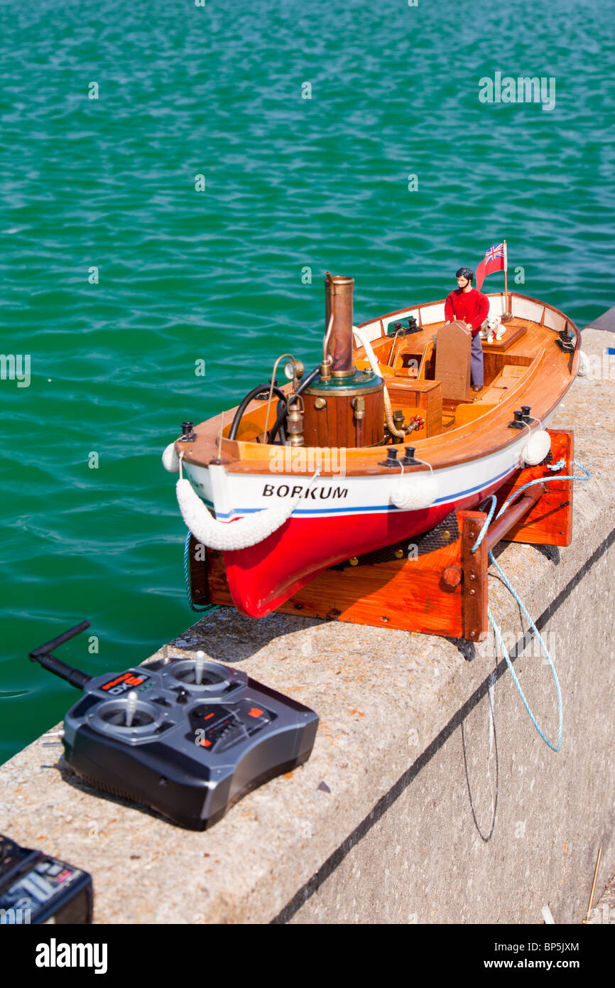 A model steam powered boat on the model boating lake at Sheringham ...