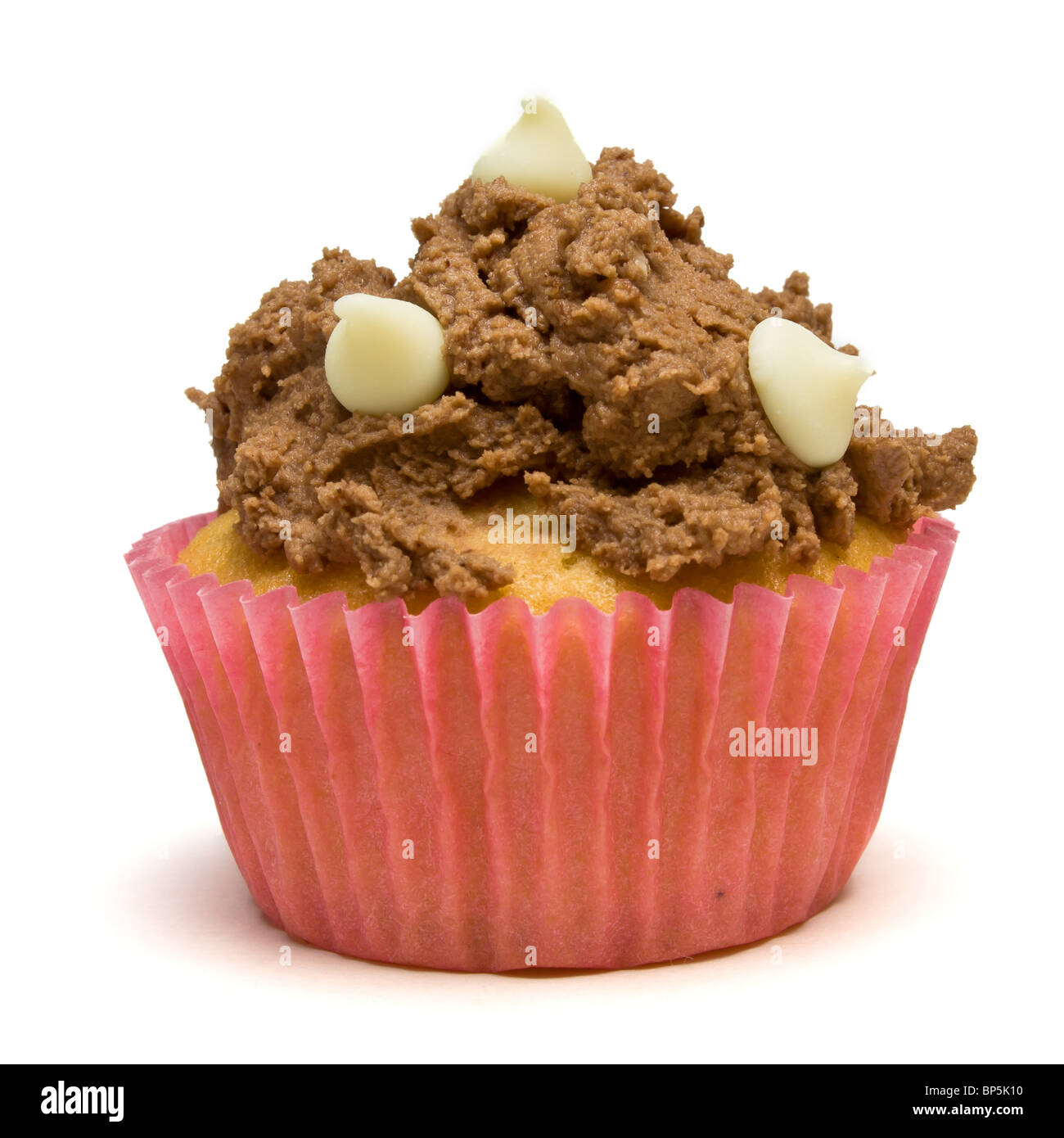 Home made milk chocolate cupcake with white chocolate drop decoration ...