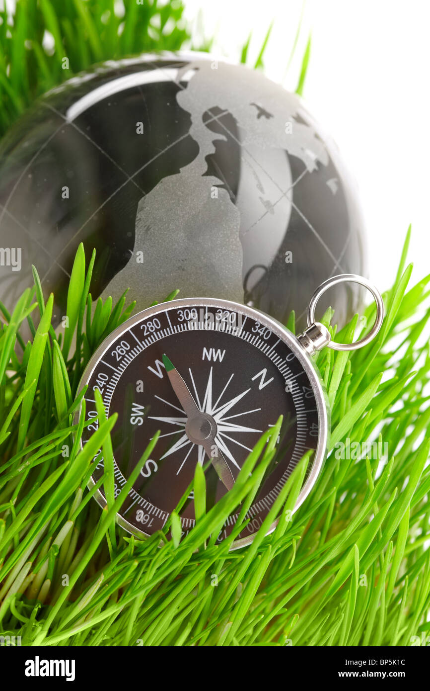 compass in green grass Stock Photo - Alamy