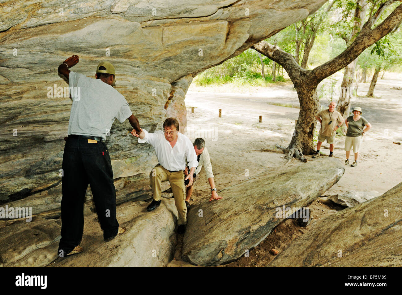 Hikers at Tsodilo Hills, UNESCO world heritage site, Botswana, Africa ...