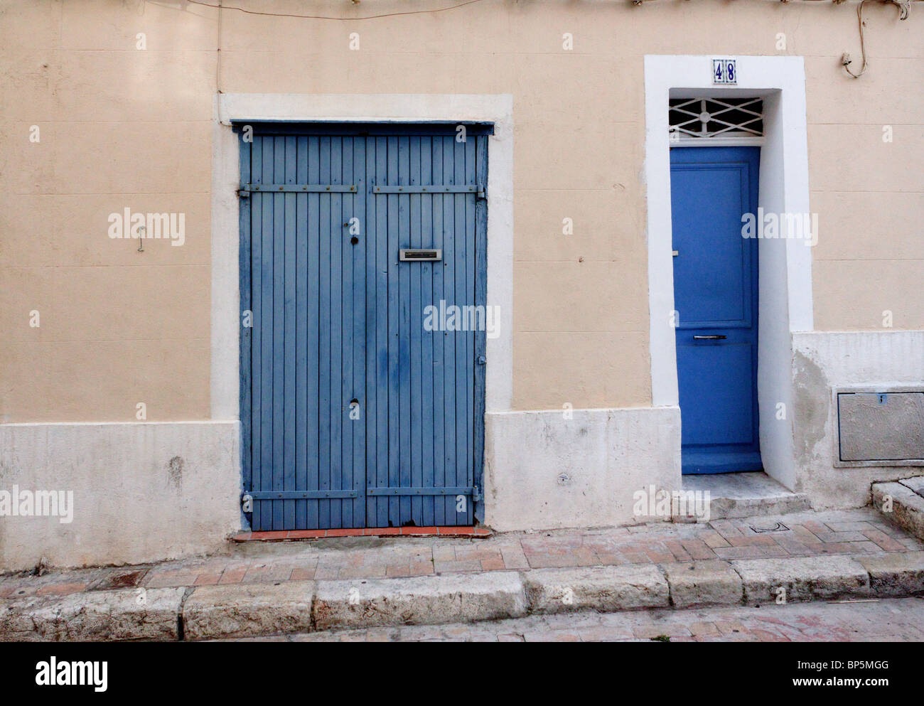 house and workshop doors in Marseille, number 48 Stock Photo - Alamy