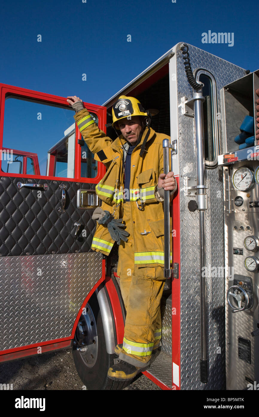 Firefighter strength hi-res stock photography and images - Alamy