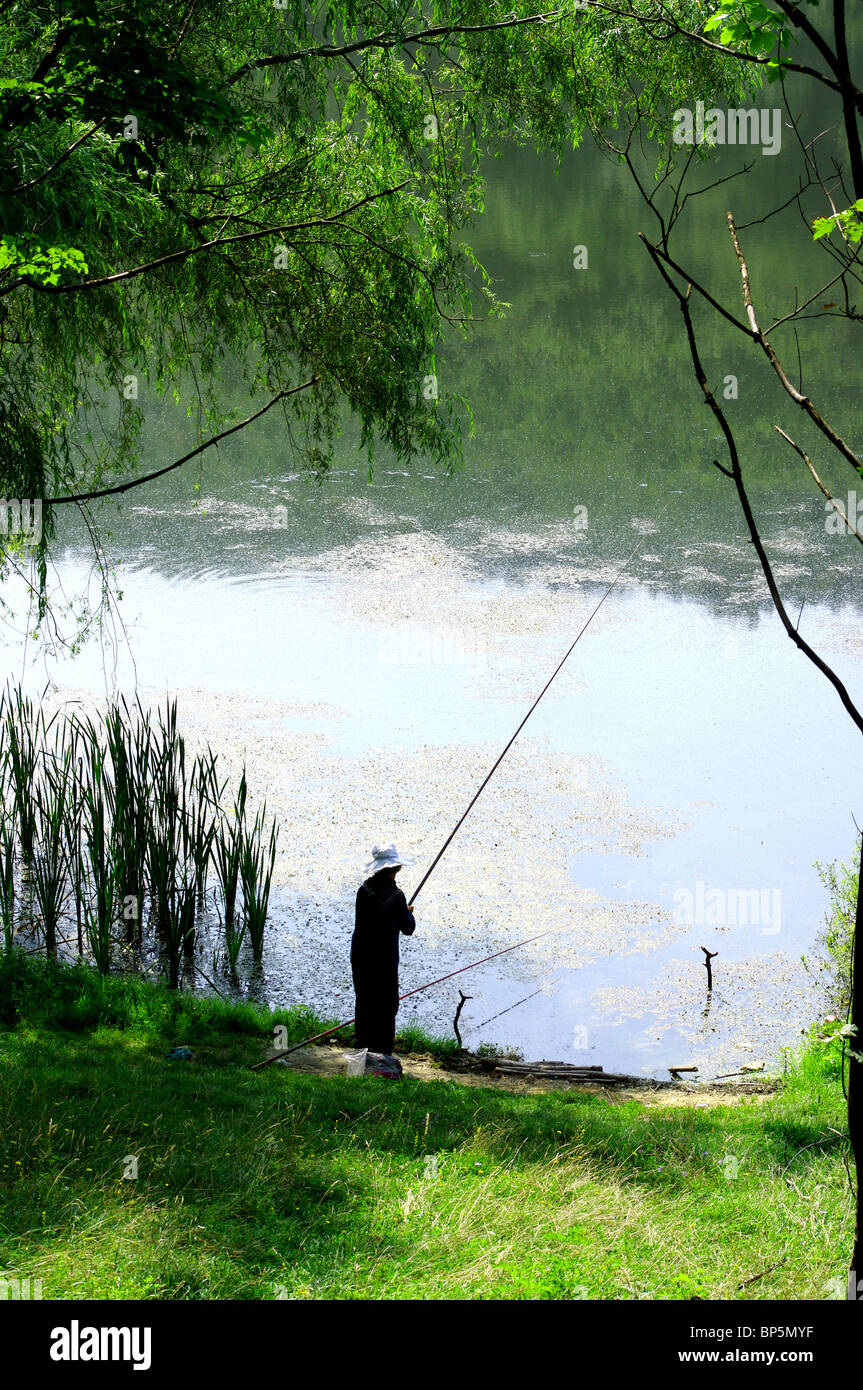 Lady fishing hi-res stock photography and images - Alamy