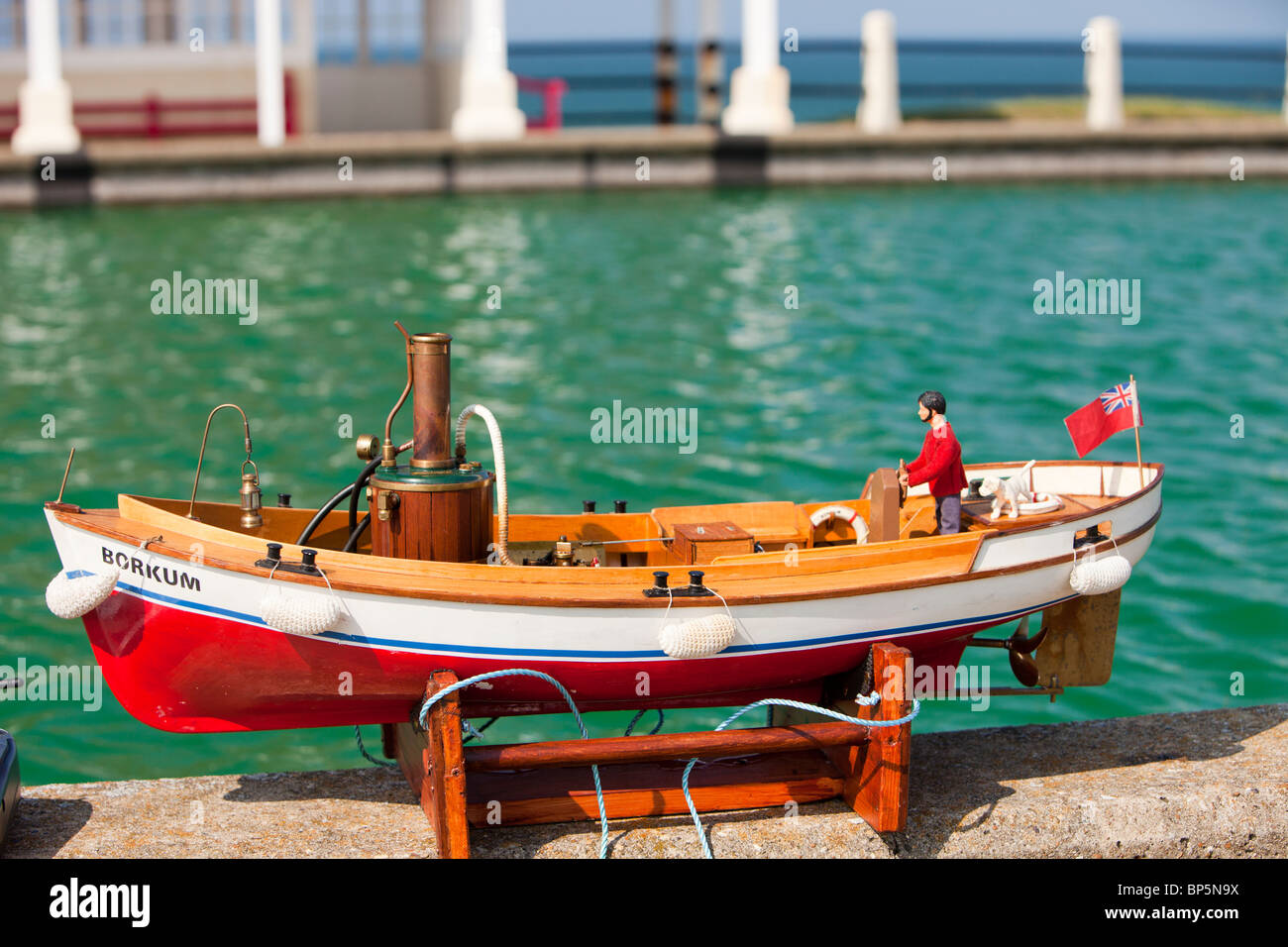 A model steam powered boat on the model boating lake at Sheringham ...