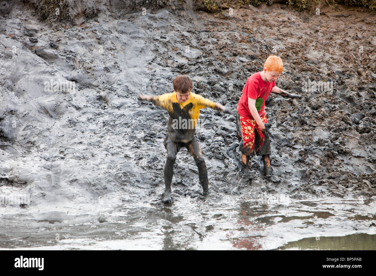 Playing in the mud hi-res stock photography and images - Alamy