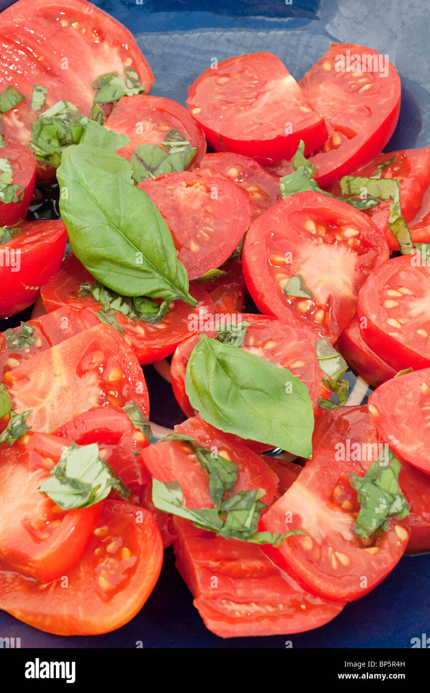 Tomatoes and basil Stock Photo - Alamy