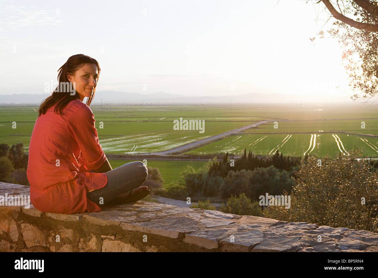 Legs women sitting stone hi-res stock photography and images - Alamy