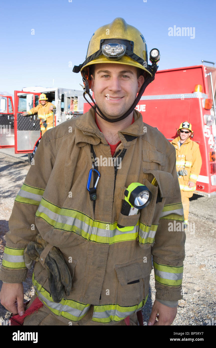Portrait of a fire fighter Stock Photo - Alamy
