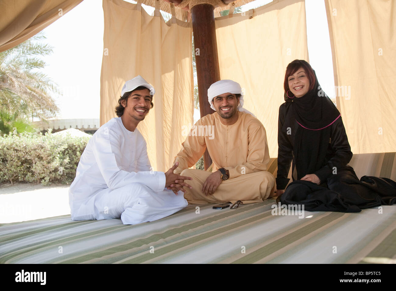 Middle Eastern people looking at camera Stock Photo - Alamy