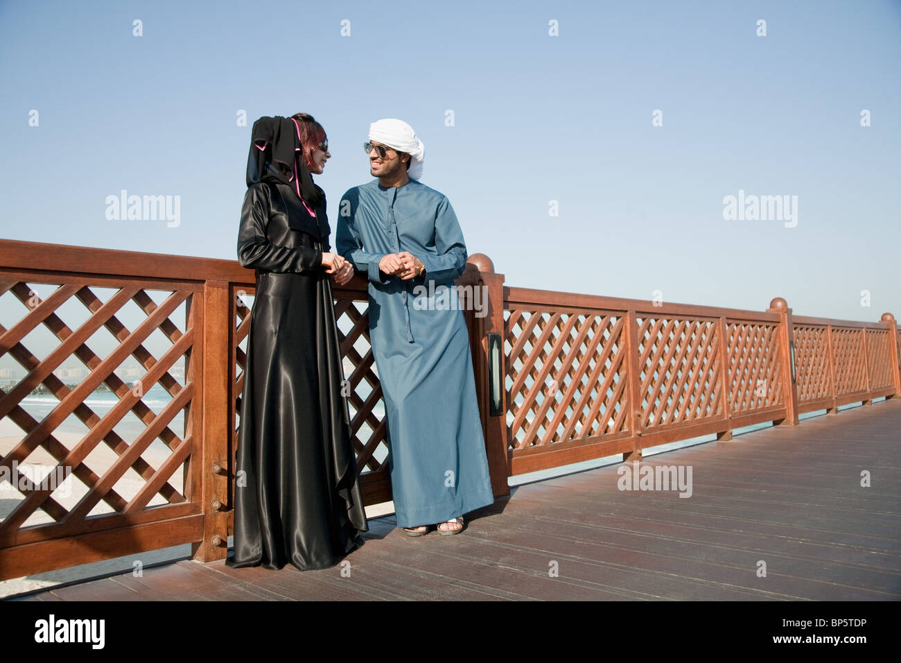 Middle Eastern people and fence, outdoors Stock Photo - Alamy