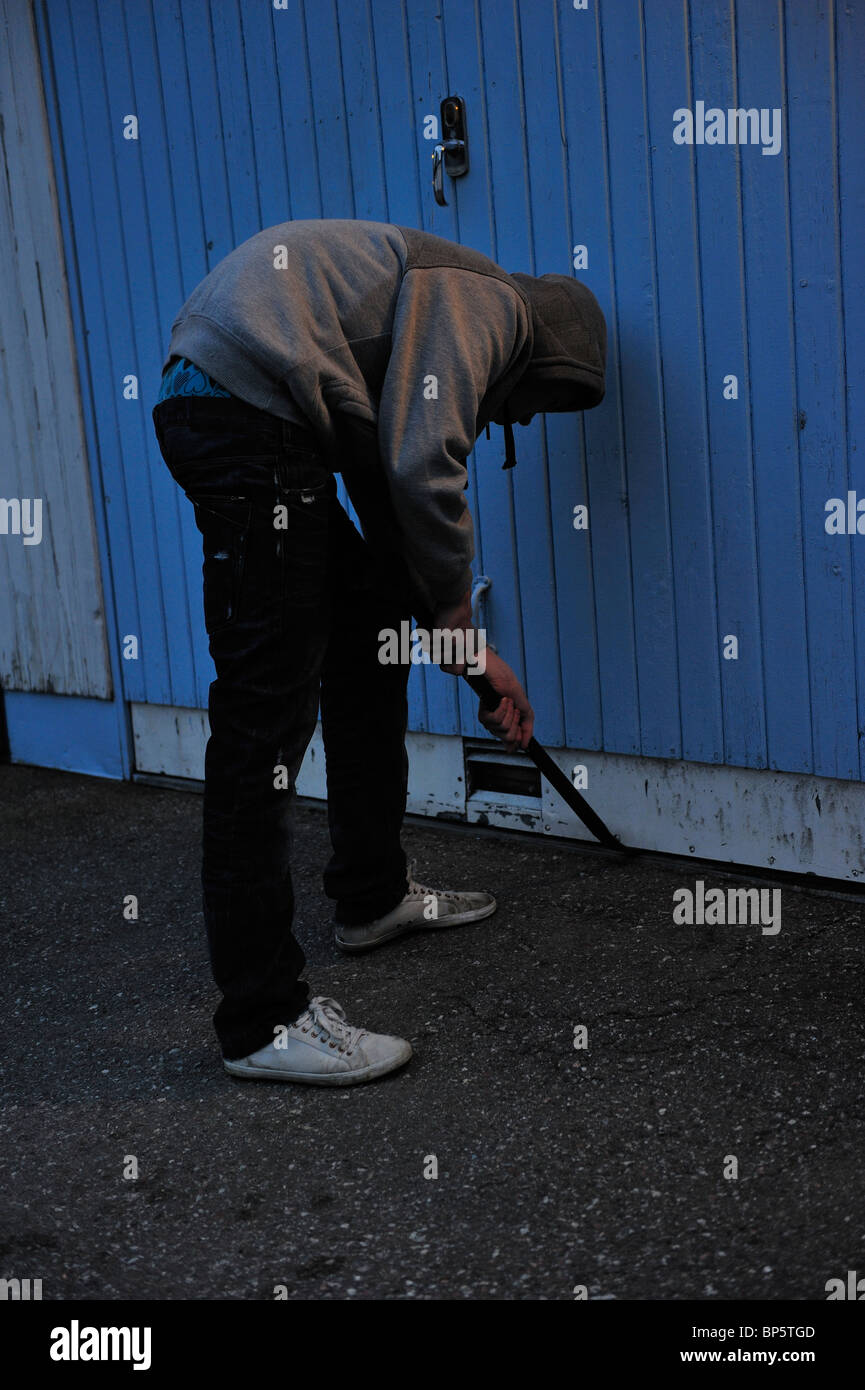 Crime criminal crowbar burglary young hi-res stock photography and ...