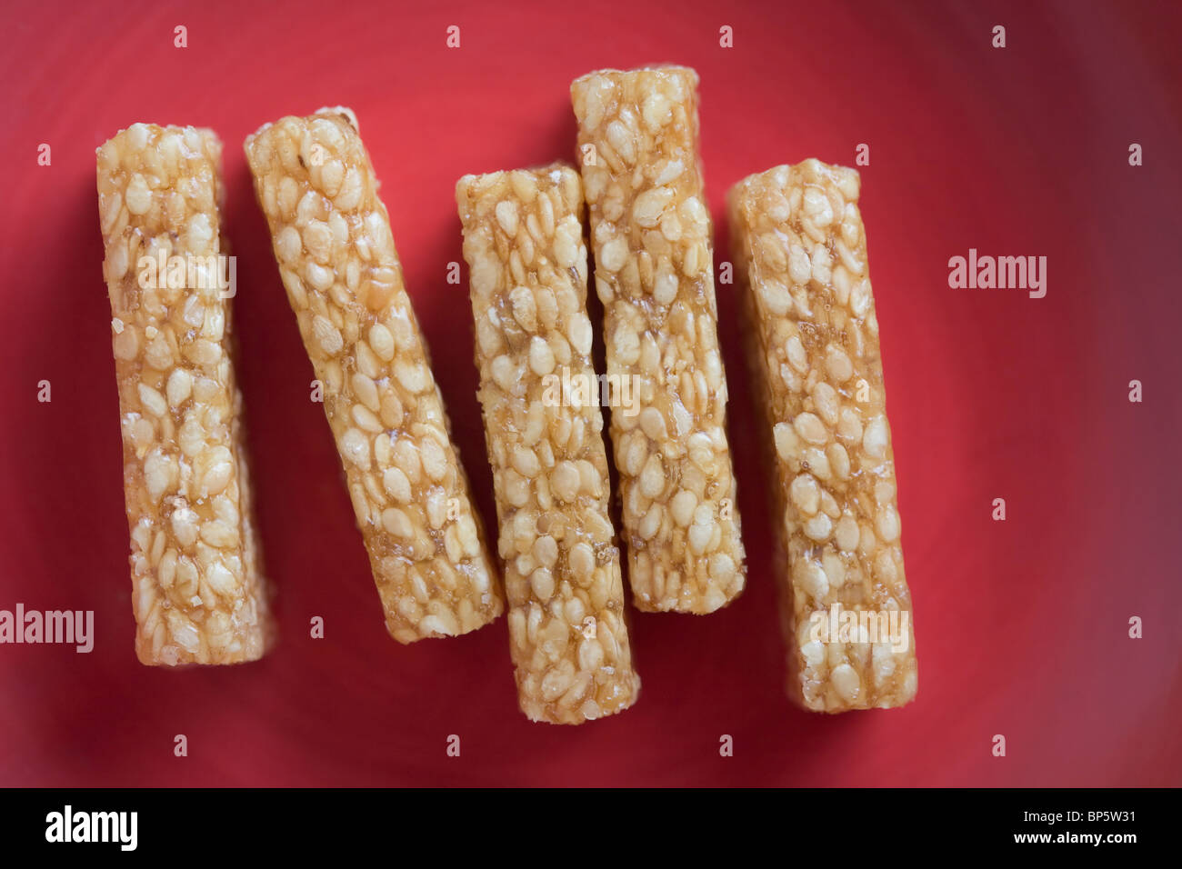 Sesame candy pieces Stock Photo - Alamy