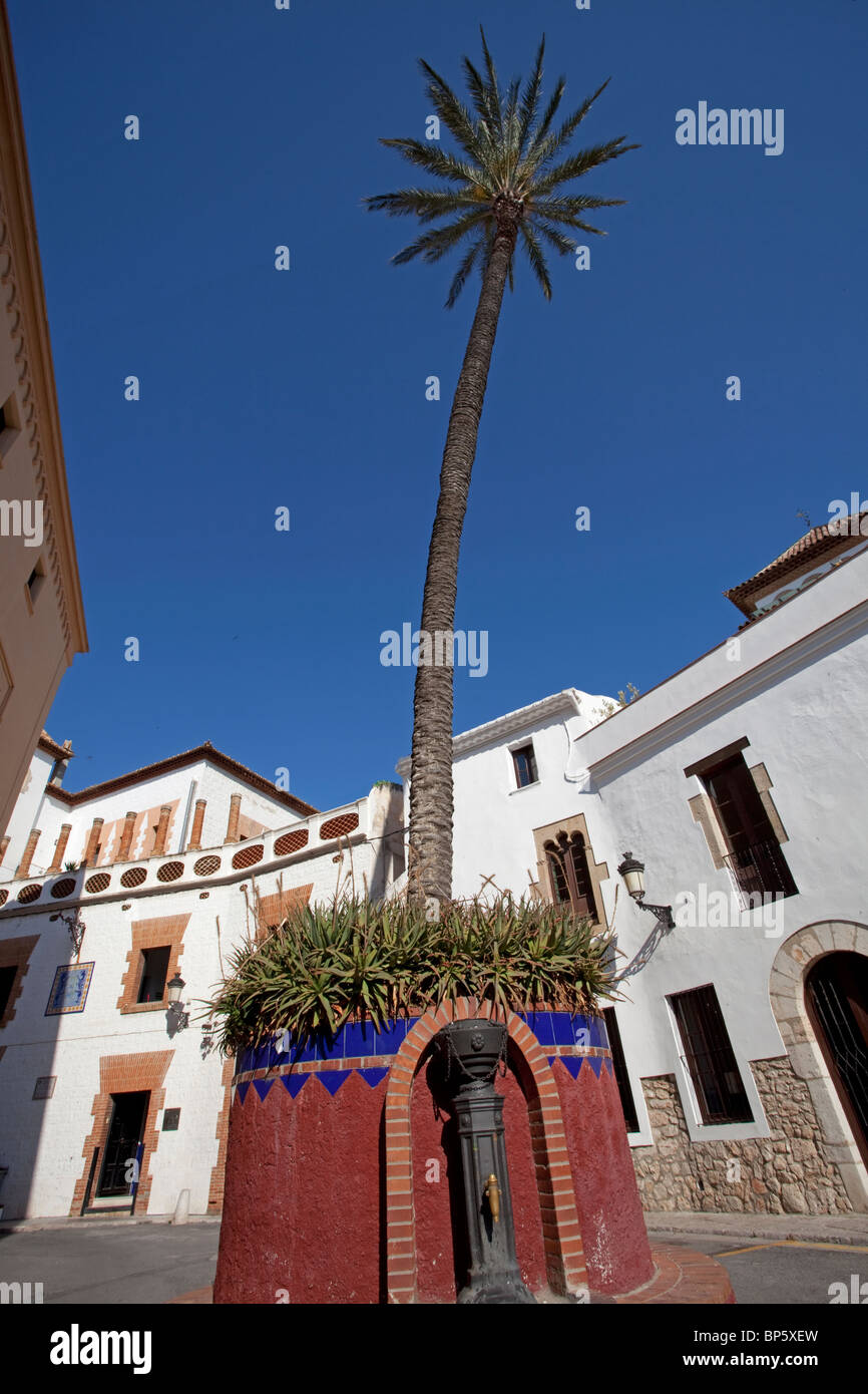 Barcelona Sitges palm tree and whitewashed street Stock Photo - Alamy
