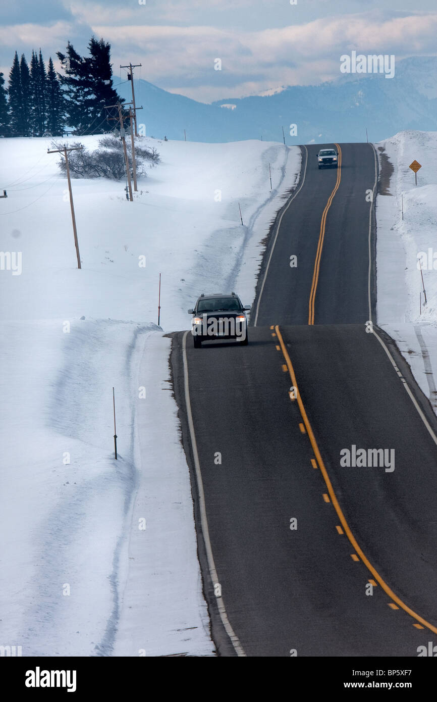 Two cars on switchback road hi-res stock photography and images - Alamy