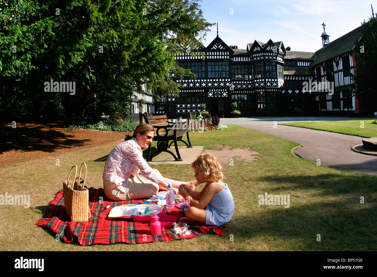 England, Cheshire, Stockport, Bramhall Park, mother and daughter taking ...