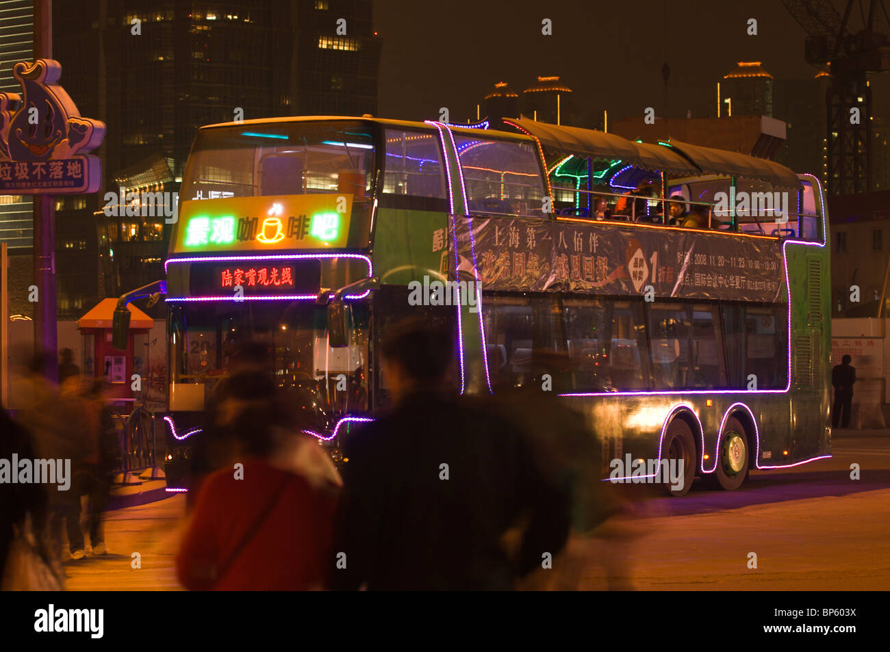 China, Shanghai. Brightly lit tour bus Stock Photo - Alamy