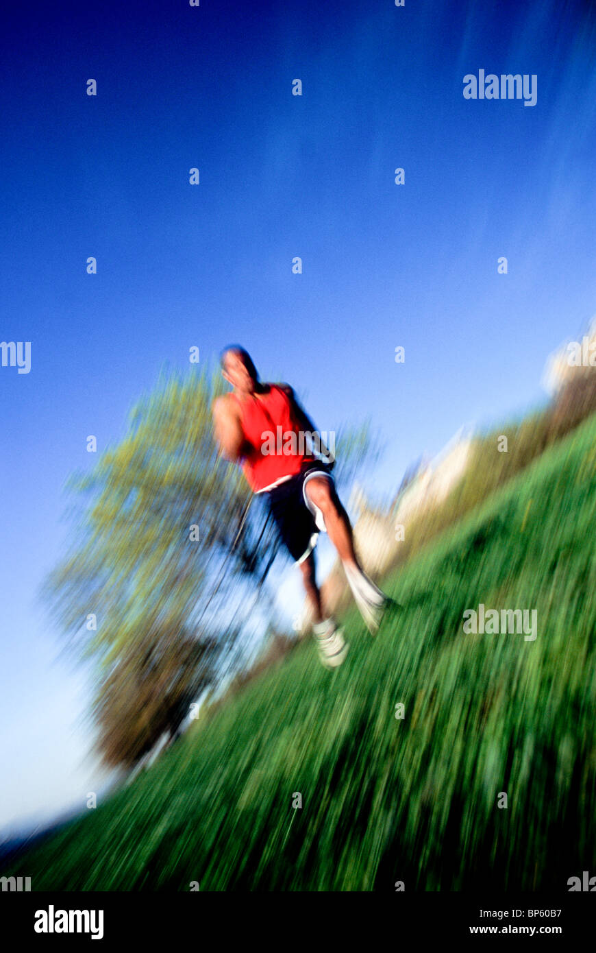 Male runner out for a fitness run Stock Photo - Alamy