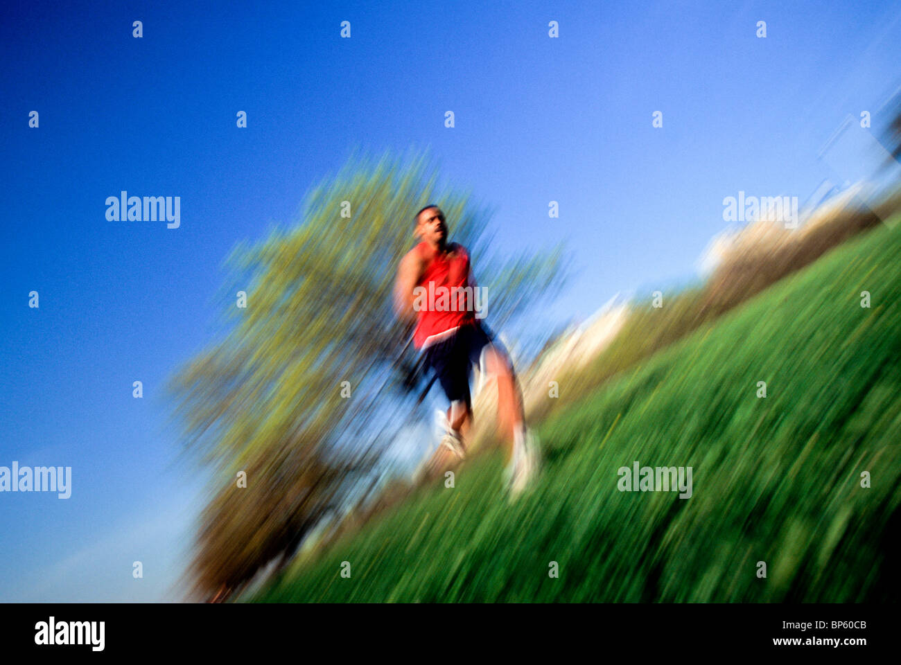 Track athletes blurry hi-res stock photography and images - Alamy