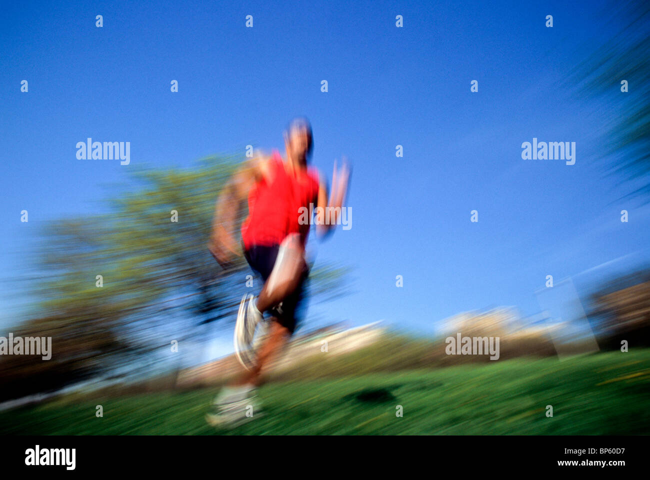 Male runner out for a fitness run Stock Photo - Alamy