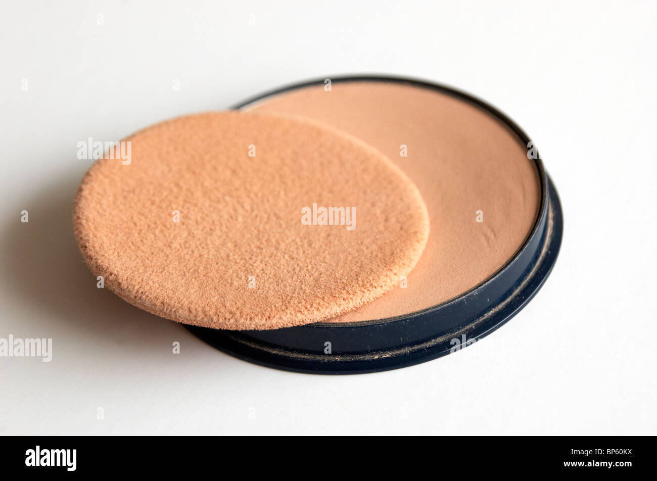 A foundation compact on a white background Stock Photo - Alamy