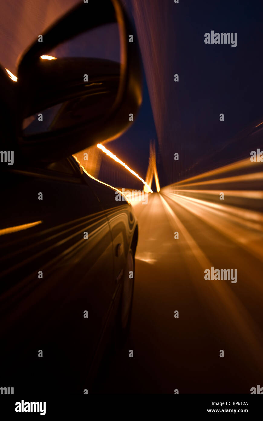 Night Driving. Long exposure of a car driving in night Stock Photo - Alamy