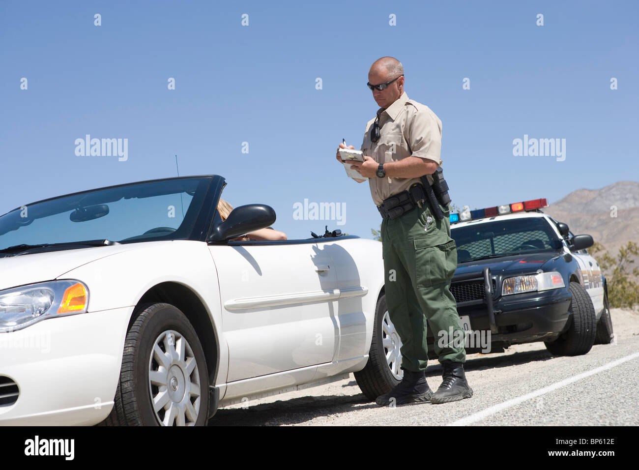 Communication sitting police officer uniform hi-res stock photography ...