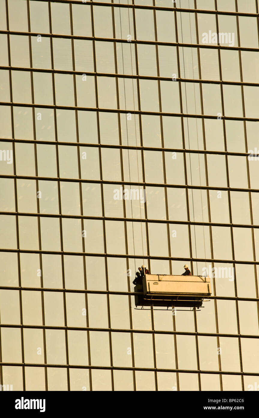 China, Shanghai. Window cleaners on the Shanghai World Financial Center ...