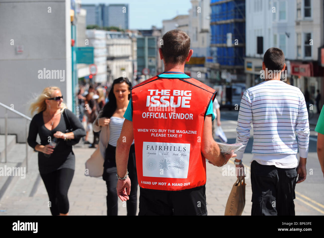 Big Issue official seller vendor Brighton city centre UK Stock Photo ...