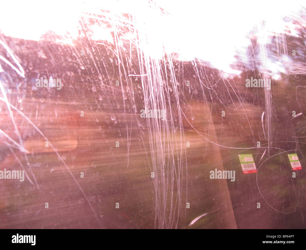 Vandals scratch train windows Stock Photo - Alamy