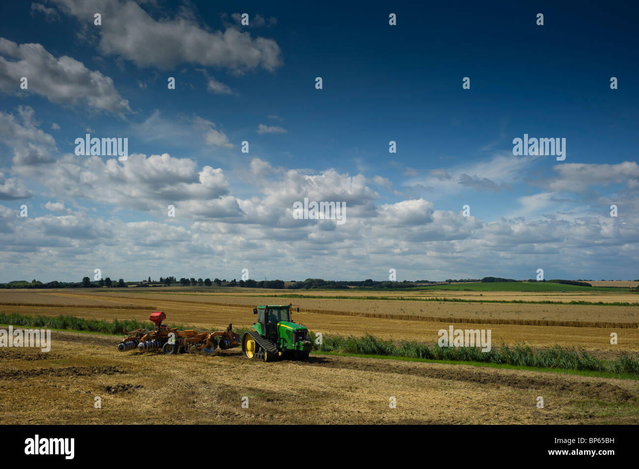 Tractor Ploughing newly mown field in kent Stock Photo - Alamy
