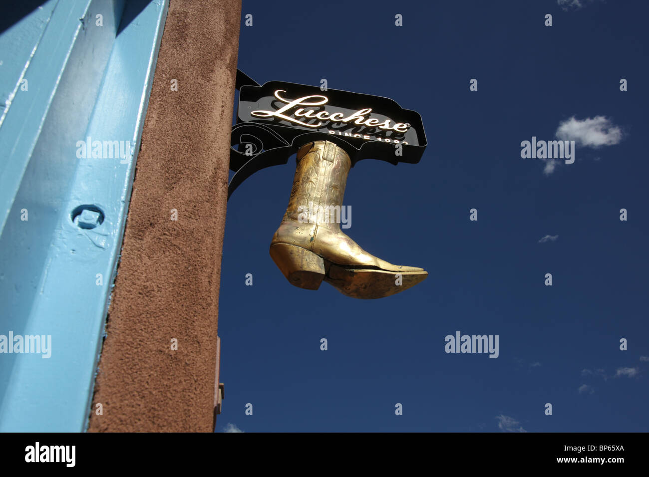 Cowboy boot shaped sign outside Lucchese Western Boots in Santa Fe, New ...