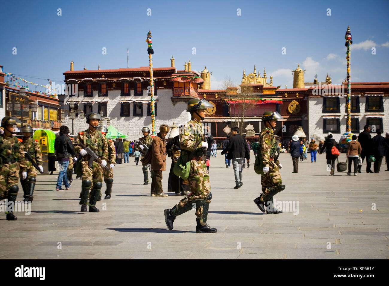 The Chinese army patrol the Barkhor square, in front of the Jokhang ...