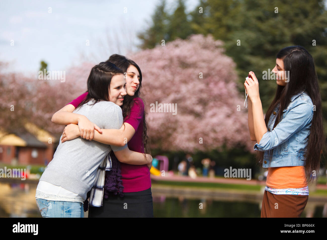 Portland, Oregon, United States Of America; Three Teenage Girls Using A ...