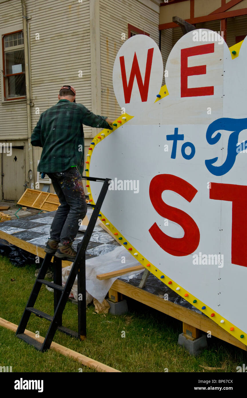 Set Builder constructing a sign for an outdoor stage play at Dell Arte ...