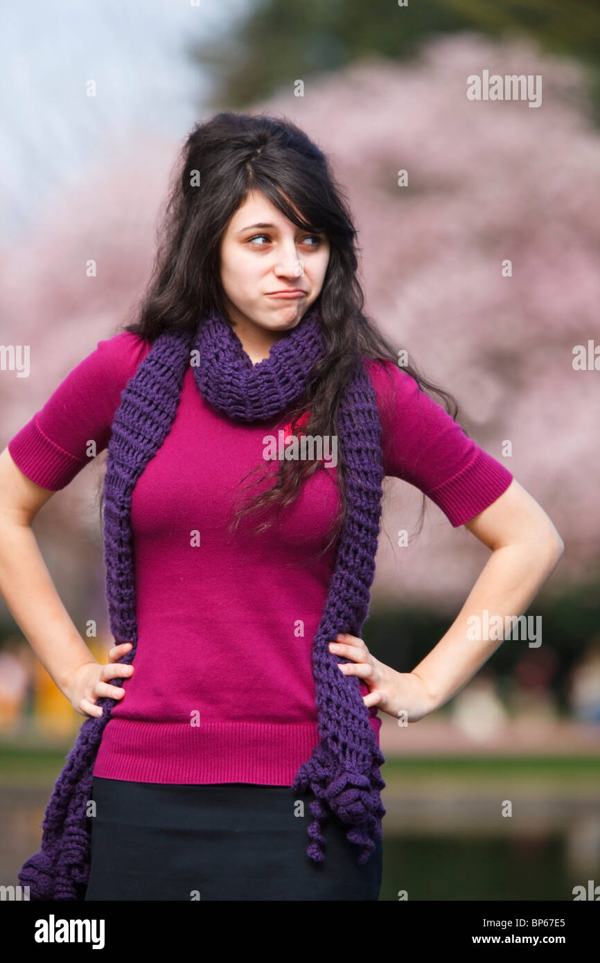 Portland, Oregon, United States Of America; A Teenage Girl Posing With ...