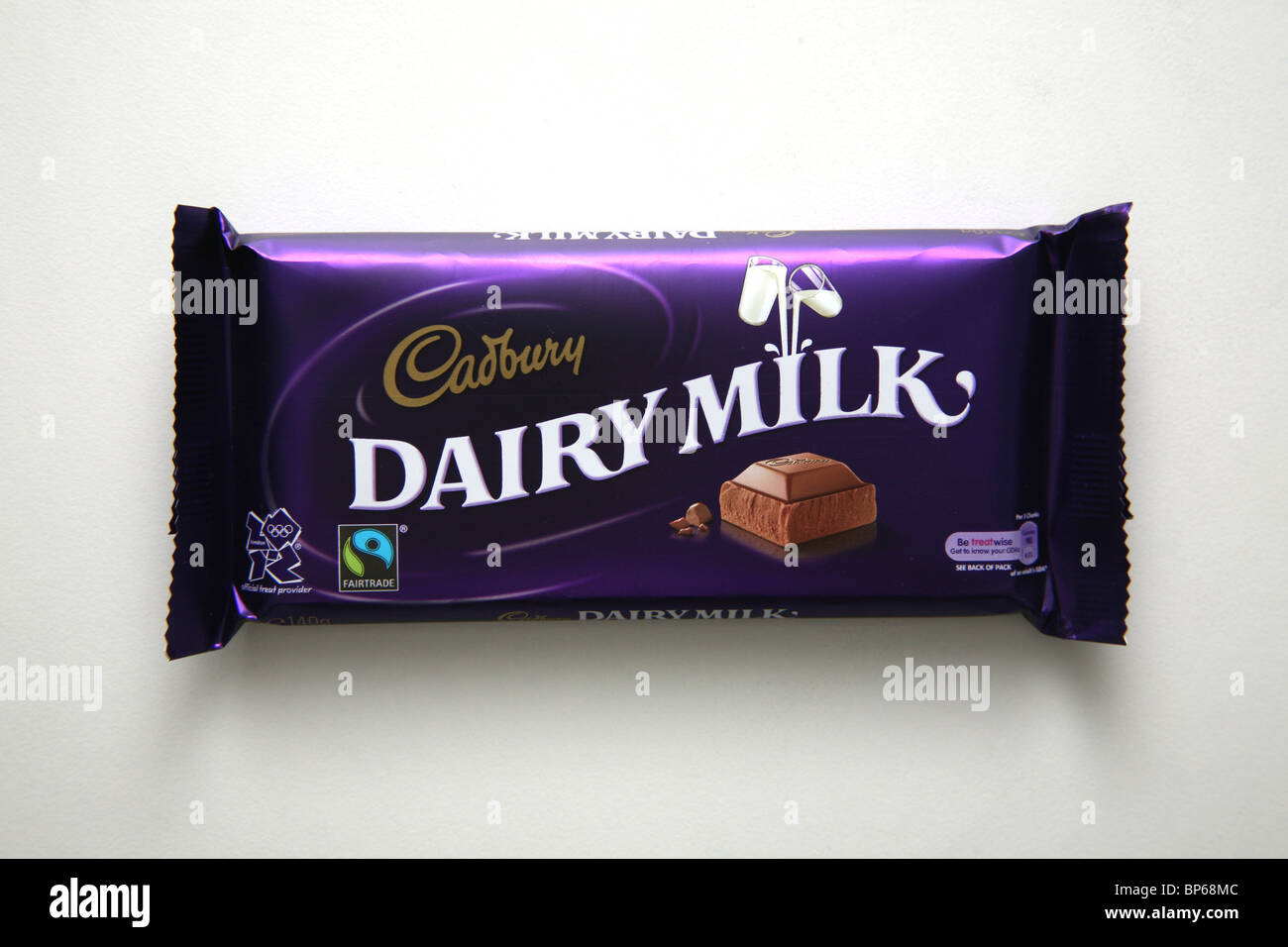 A bar of Cadbury Dairy Milk chocolate in its wrapper Stock Photo - Alamy