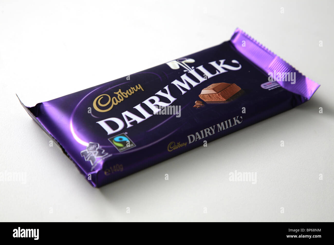 A bar of Cadbury Dairy Milk chocolate in its wrapper Stock Photo - Alamy