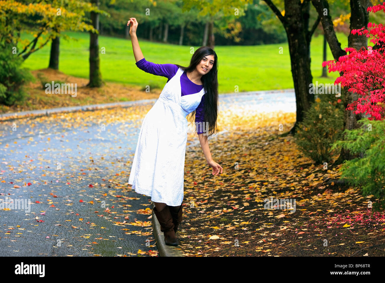 Portland, Oregon, United States Of America; A Teenage Girl Walks ...