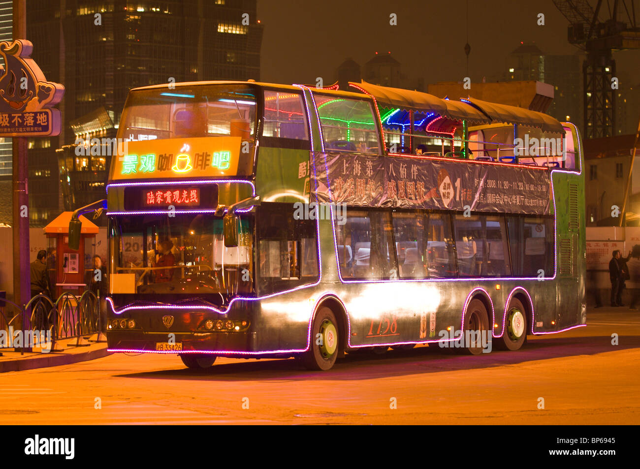 China, Shanghai. Brightly lit tour bus Stock Photo - Alamy