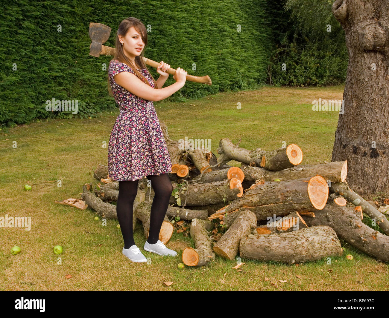 girl axe logs cutting Stock Photo - Alamy