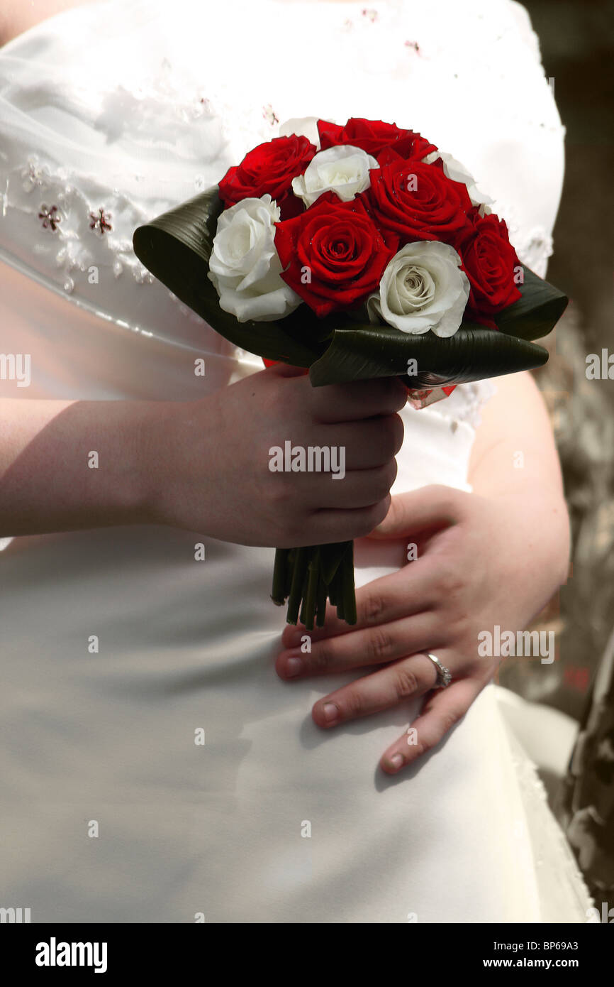 A pregnant bride on her wedding day Stock Photo - Alamy