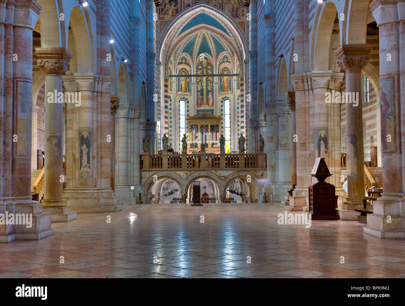 Nave of San Zeno church in Verona showing ornate paintings and carvings ...