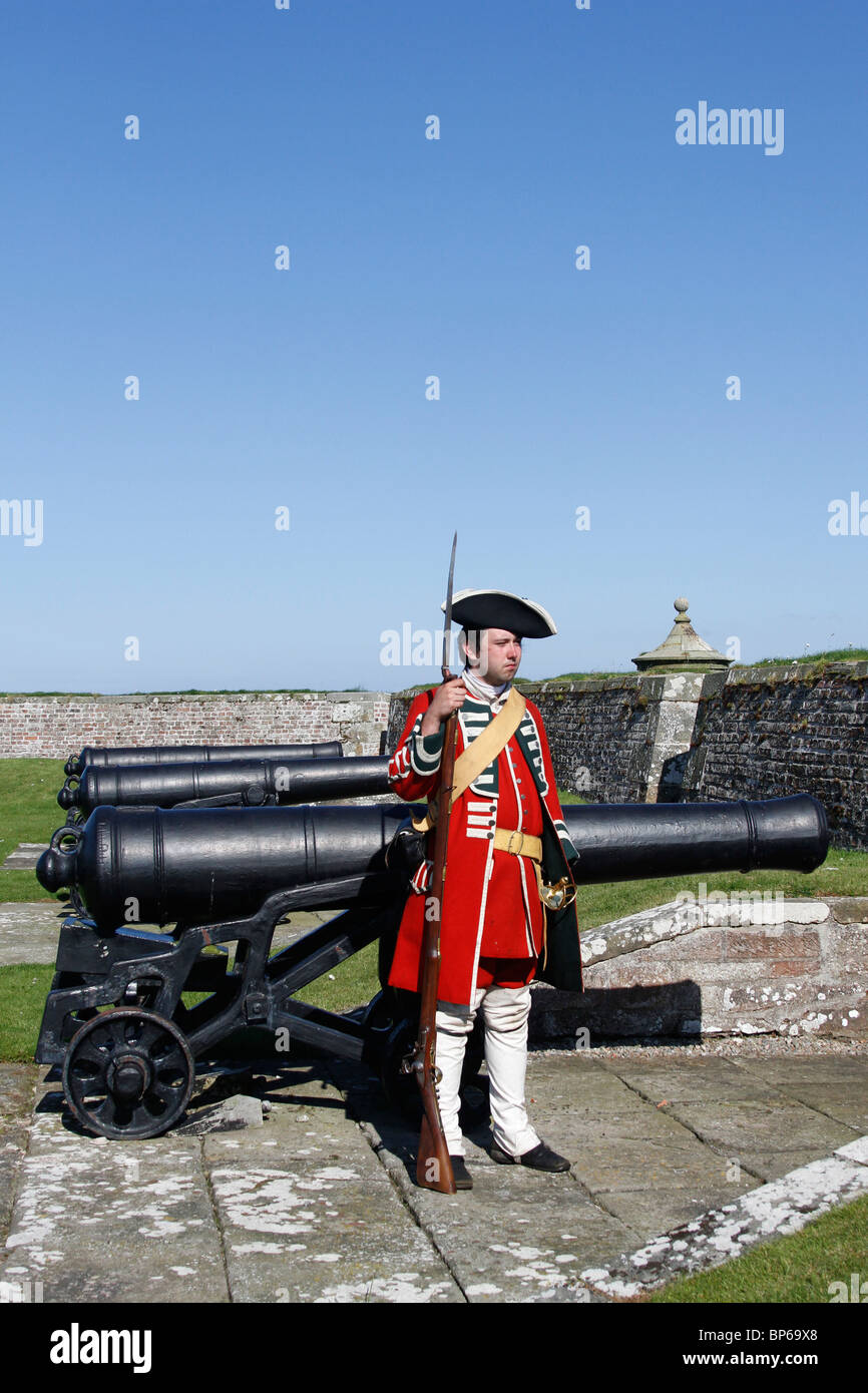 Cannon & Armed English Redcoats soldiers at British Army Fort George, a ...
