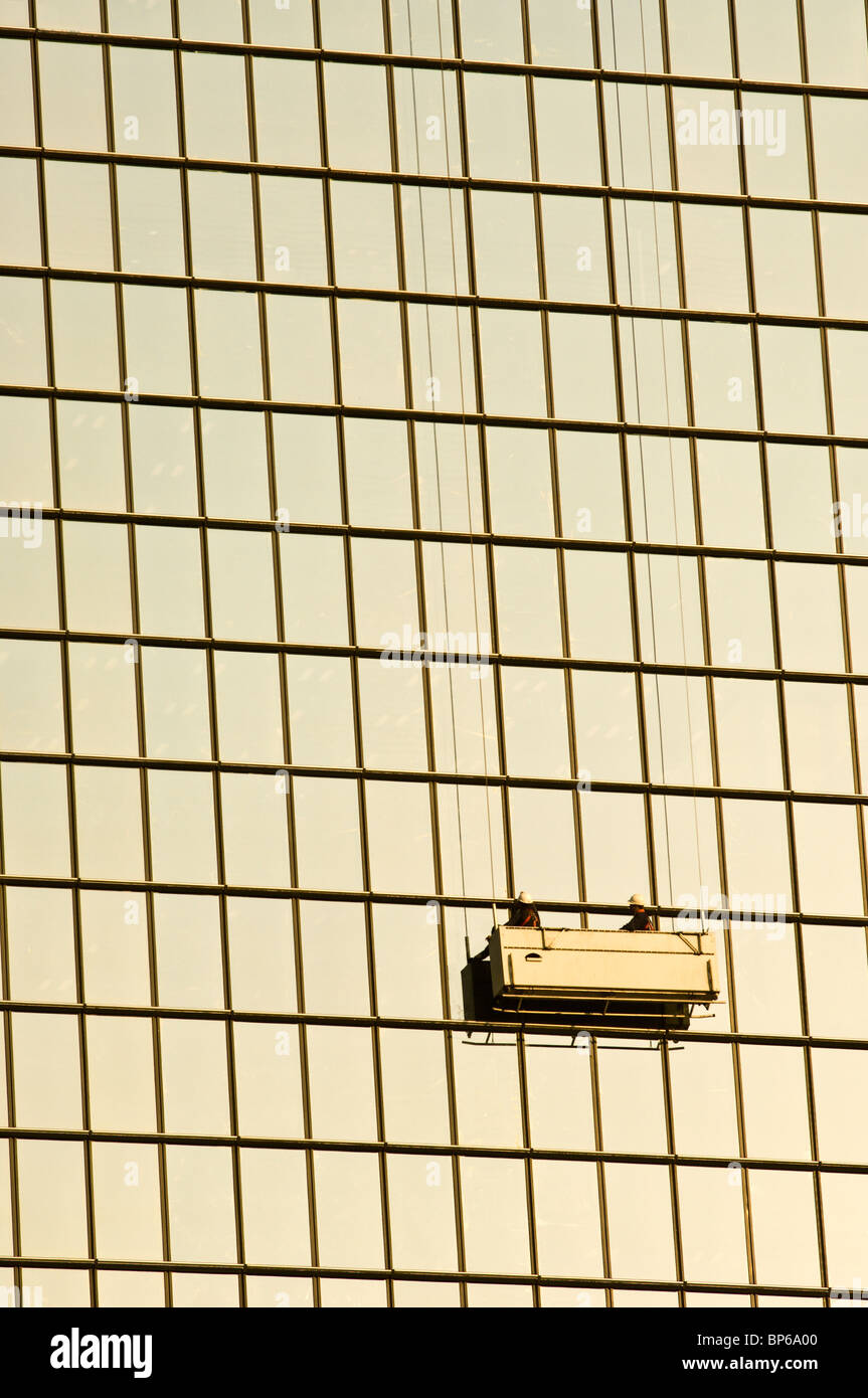 China, Shanghai. Window cleaners on the Shanghai World Financial Center ...