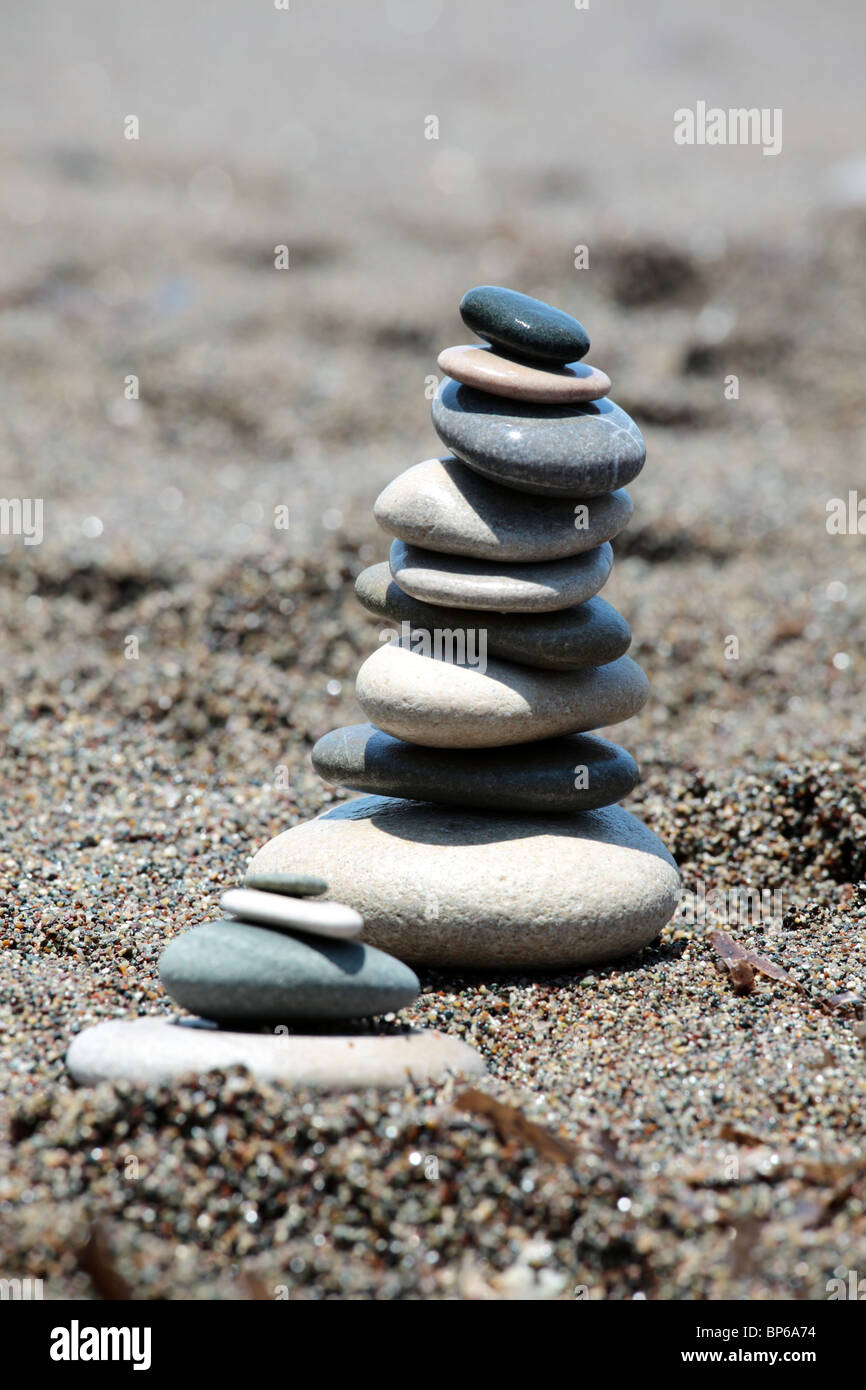 Balanced stones pyramid on beach hi-res stock photography and images ...