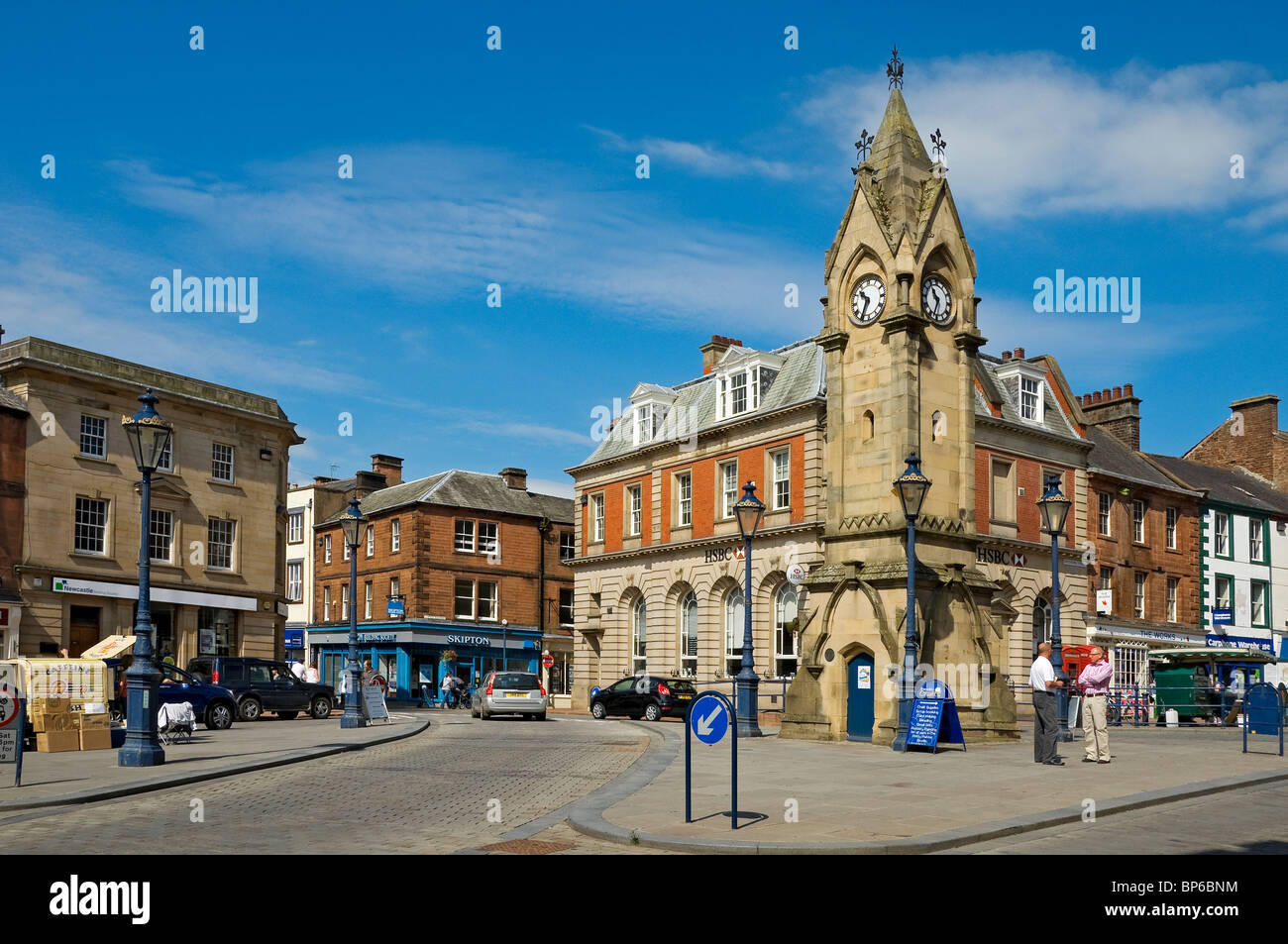 Town centre in summer Musgrave Monument clocktower Market Square ...