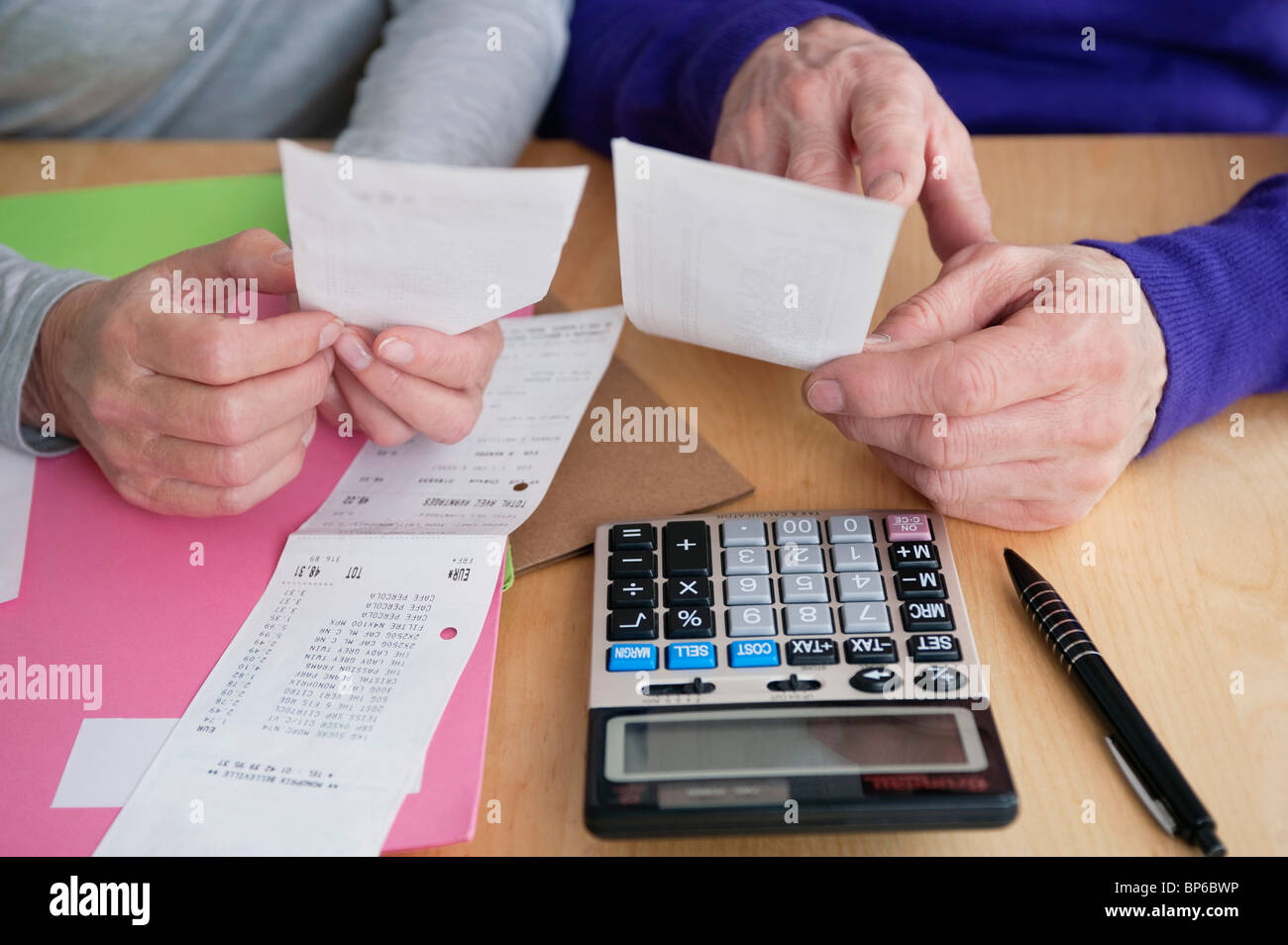 Sorting out bills hi-res stock photography and images - Alamy