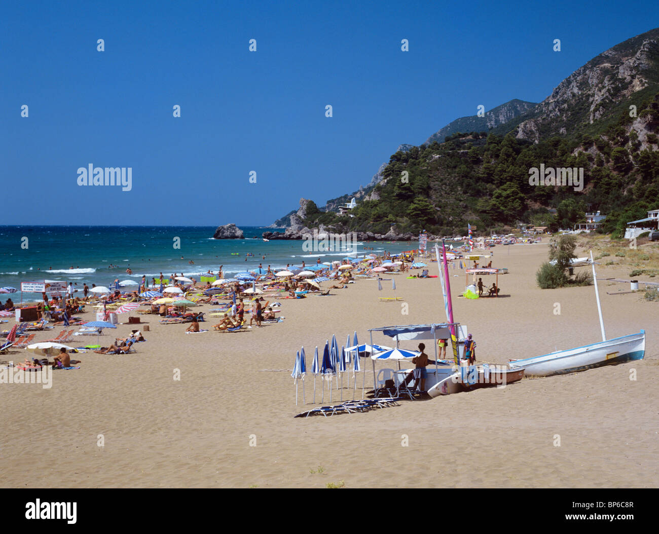 Corfu - Sandy beach at the west coast resort of Glyfada Stock Photo - Alamy